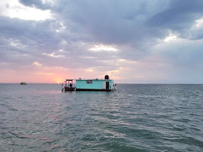 Purple skies and calm waters, proving Mother Nature knows exactly what she's doing with her color palette.