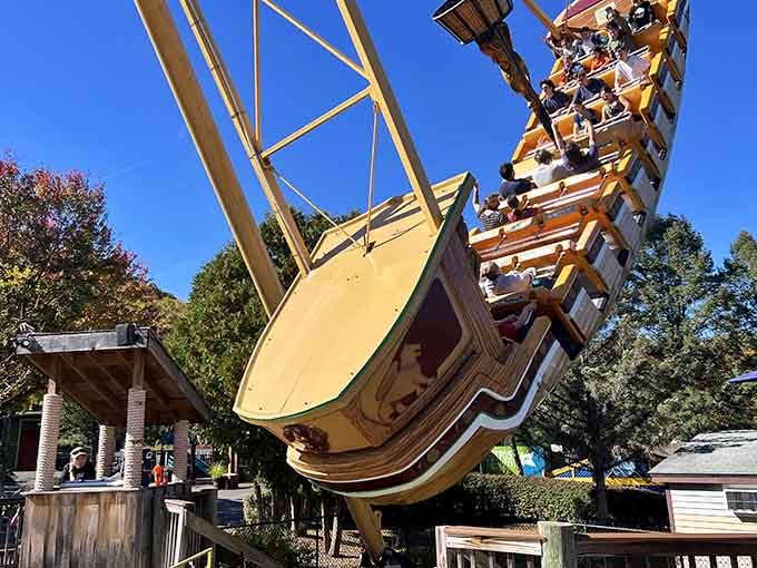 The pirate ship swings higher and higher, testing your stomach's resolve and your grip on the safety bar.