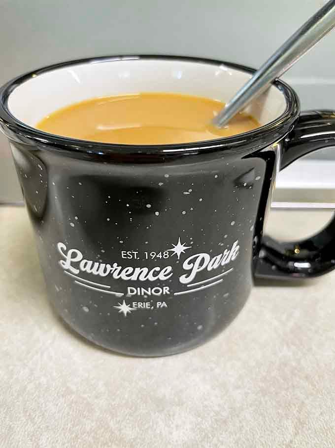 Locally roasted coffee served in a classic speckled mug tastes like community, conversation, and countless refills you'll actually want.