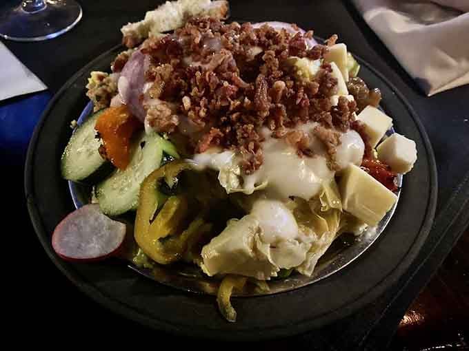 That salad bar creation looks like someone took "famous" seriously, piling on toppings until the lettuce cried uncle with joy.