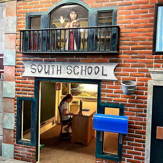The two-story schoolhouse lets kids experience education from simpler times, complete with that classic brick facade.