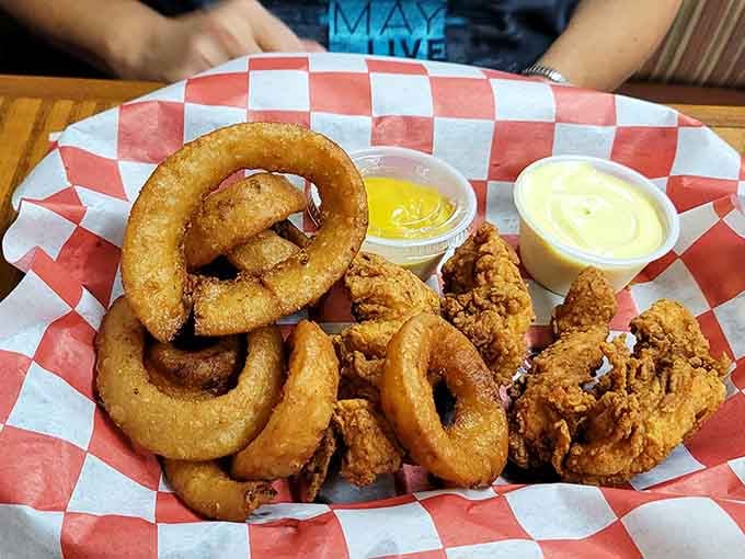 Chicken tenders and onion rings prove that sometimes the supporting cast steals the show with crispy, golden excellence.