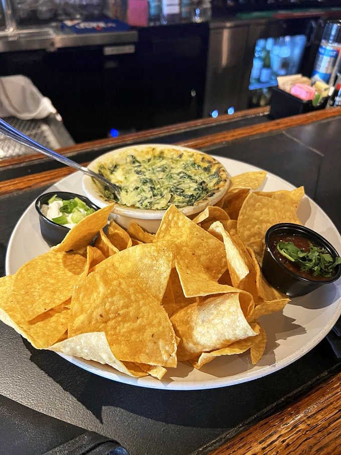 That spinach and artichoke dip could make a vegetable-hater reconsider their entire life philosophy, one chip at a time.