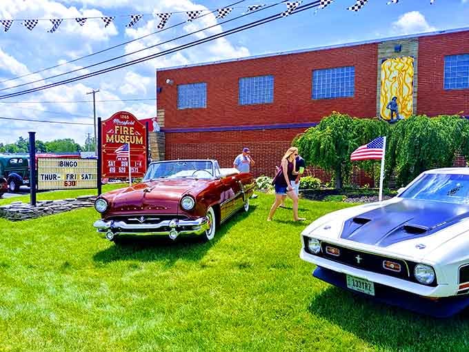Classic cars and fire trucks proving that nostalgia looks better when it's actually preserved, not just Instagram filtered.