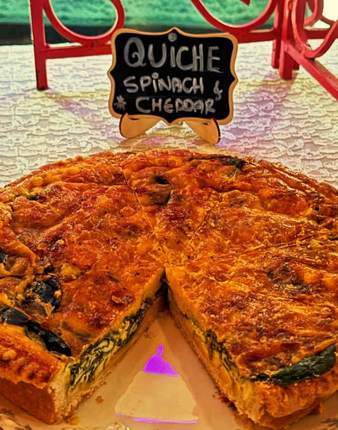 That golden, flaky quiche crust is basically a love letter written in butter and European baking expertise.