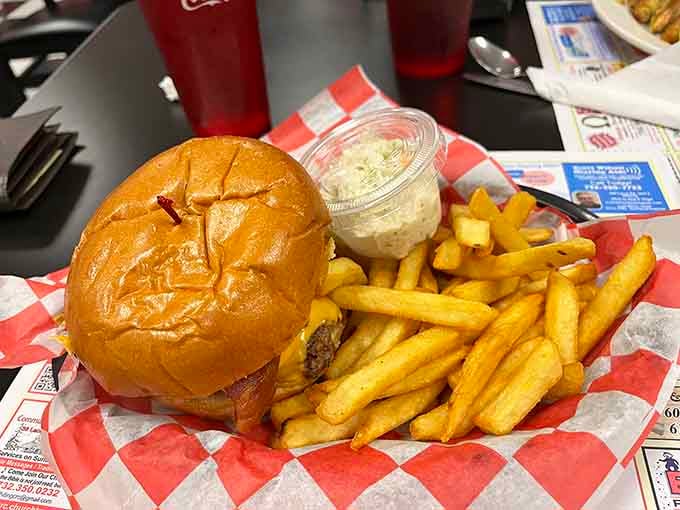A classic cheeseburger with golden fries, proving that sometimes the simplest pleasures are the most satisfying.