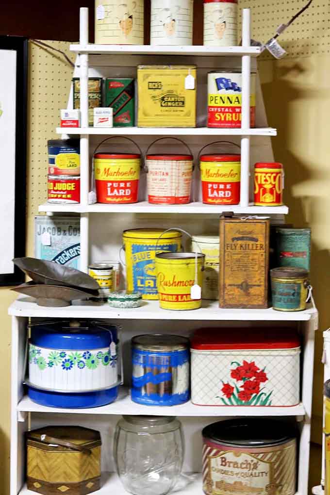 Old advertising tins with graphics so charming they make modern packaging look like it's not even trying.