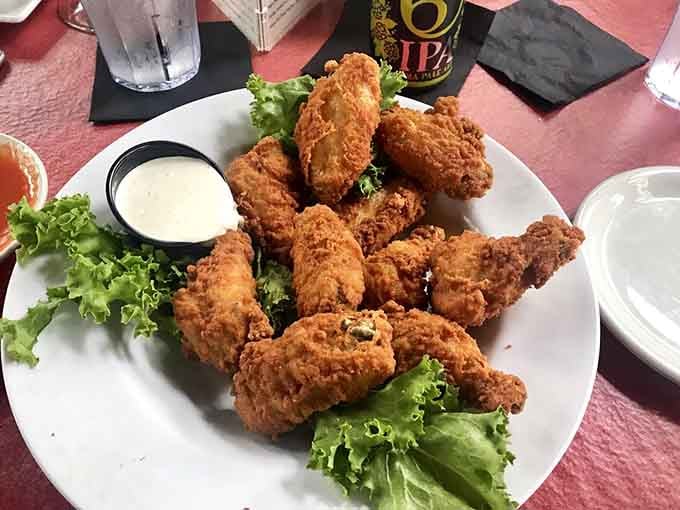 Crispy wings with a golden coating that promises crunch in every bite, because sometimes simple done right beats fancy.