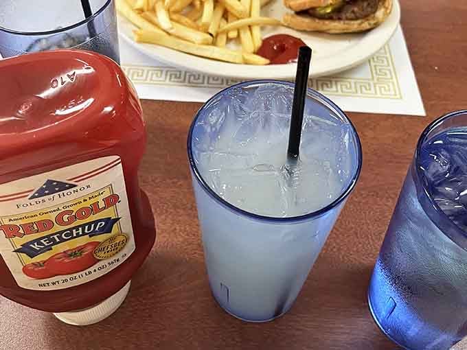Blue cups of lemonade and Red Gold ketchup signal you're in for honest, no-frills Midwestern dining done right.