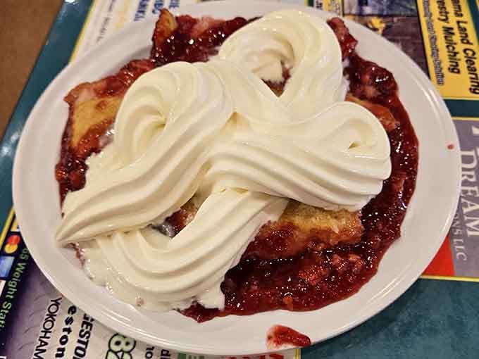 Dessert arrives looking like a cloud decided to take a vacation on top of pie.