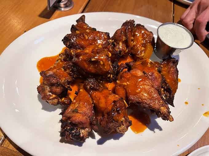 Hot wings with that perfect glaze prove that chicken can be both messy and absolutely worth every napkin.