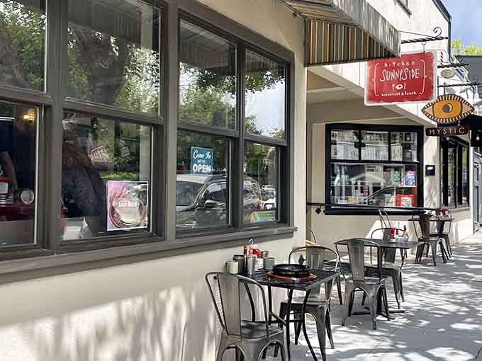Sidewalk seating where the biggest decision is whether to order another coffee or just soak up more sunshine.