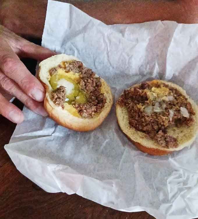 The chili bun cross-section reveals layers of savory meat and tangy mustard that'll haunt your dreams tonight.