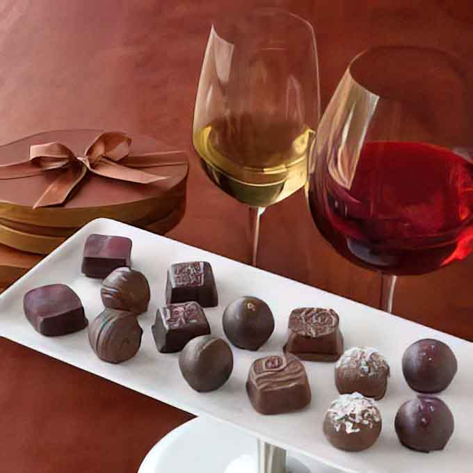 Pairing fine chocolates with wine while pondering whodunit, because sophistication and sleuthing go hand in hand beautifully.