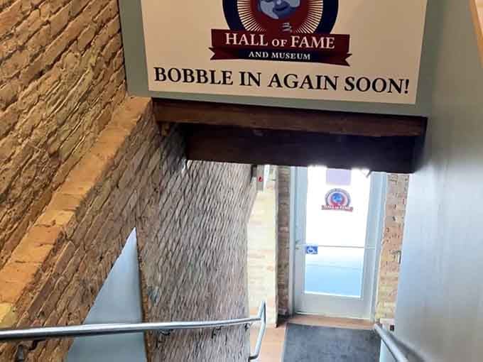 That stairway sign says it all: you'll definitely be bobbling back in soon after experiencing this wonderfully weird collection.