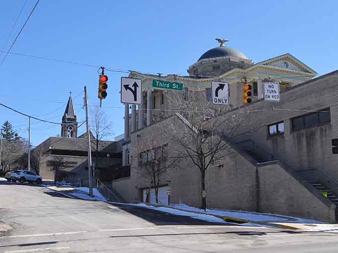 The courthouse dome rises majestically, reminding everyone that civic pride never goes out of style in proper towns.