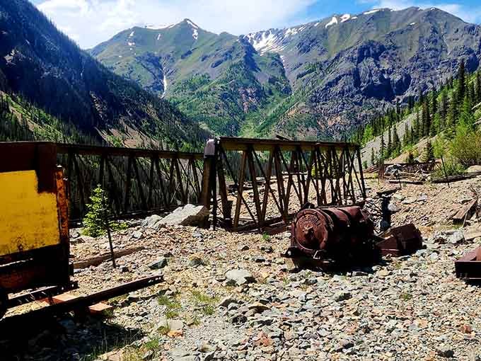 The mountainside reveals layers of mining history, each terrace representing decades of determined digging and dreaming big.