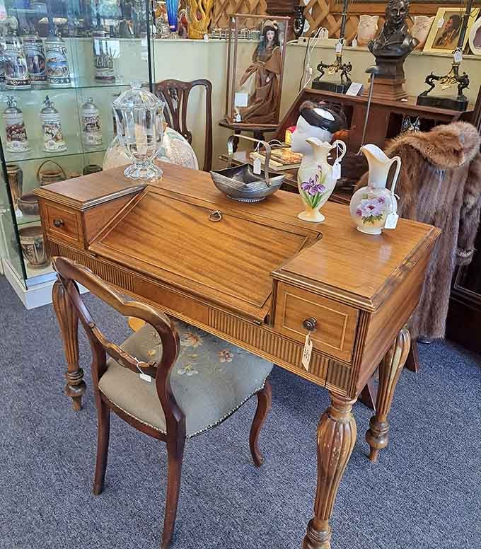 This vintage desk has more character in one drawer than most modern furniture has in its entire existence.