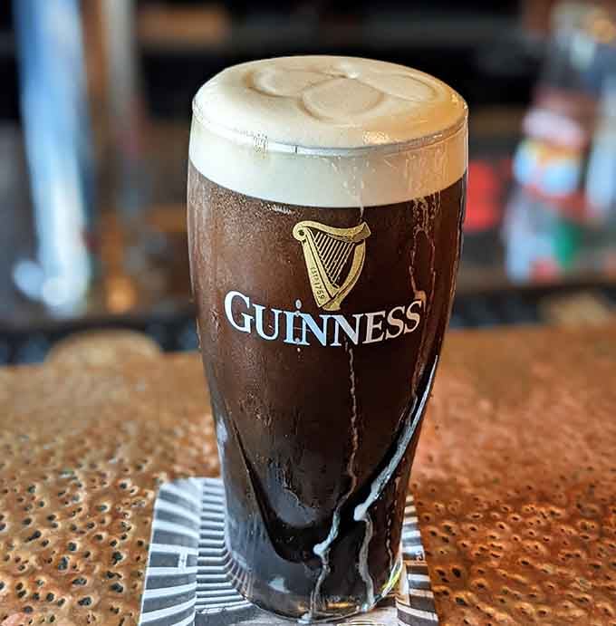 A properly poured Guinness with that perfect creamy head is basically liquid poetry in a glass.