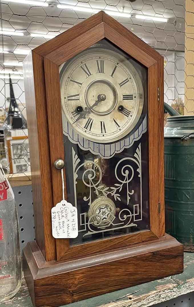 A mantel clock with Roman numerals and real craftsmanship, back when timepieces were furniture, not just function.