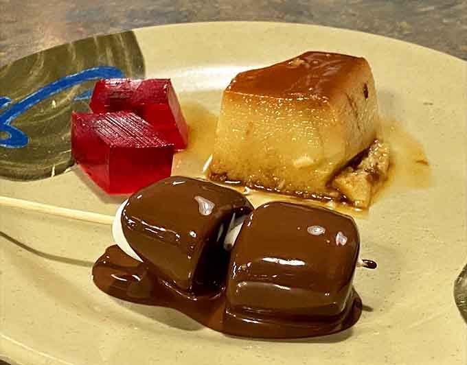Chocolate-covered treats and flan sitting together like old friends, silently judging your claim that you're "too full for dessert."
