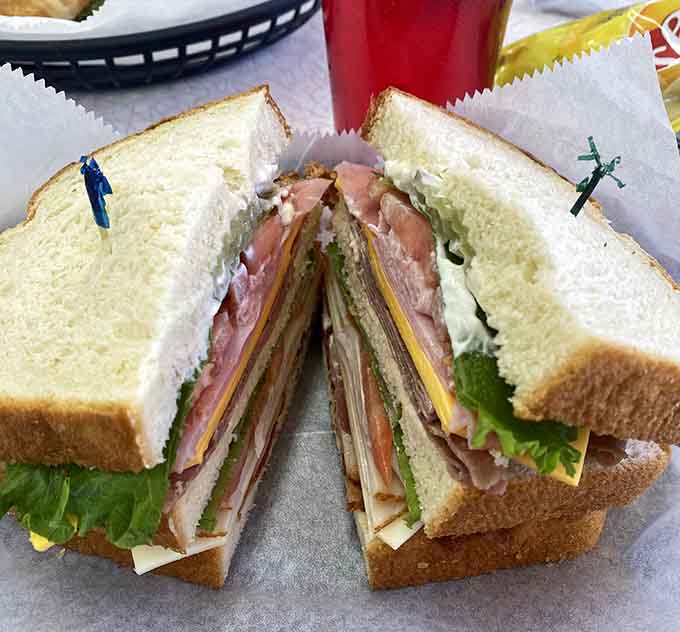 This club sandwich stacks up like a delicious Jenga tower that you actually want to see fall apart.