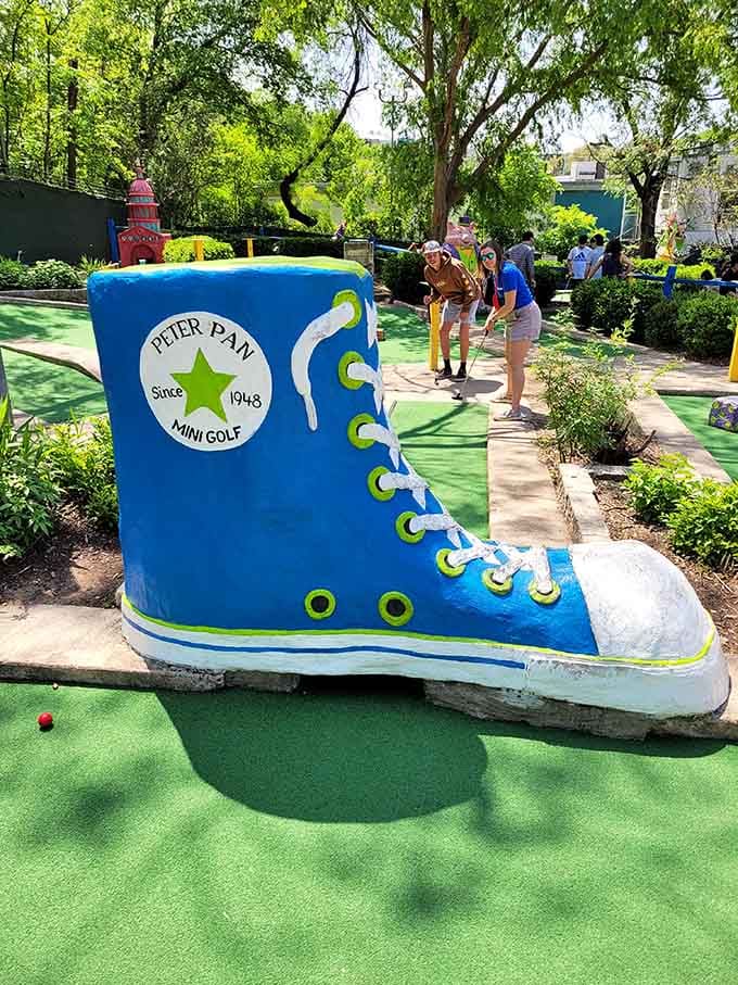 That giant blue sneaker proves Peter Pan never grew up, and judging by the size, never will need to either.