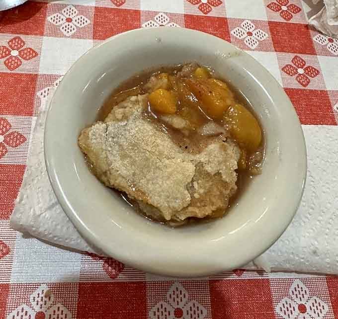 Peach cobbler that tastes like summer in the South, sweet and warm and absolutely worth loosening your belt.