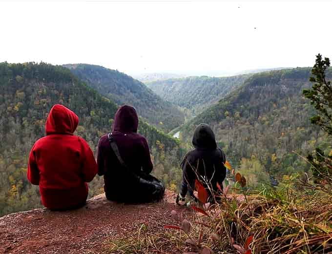 Three friends contemplating the gorge, probably wondering why they ever thought they needed to leave Pennsylvania for adventure.