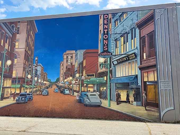 Evening falls on Chillicothe Street, where vintage cars and neon signs transport you to Portsmouth's bustling heyday.