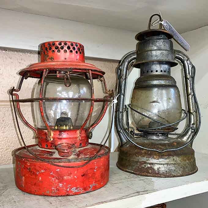 Weathered lanterns that once guided folks through darkness now illuminate your quest for authentic vintage character and charm.