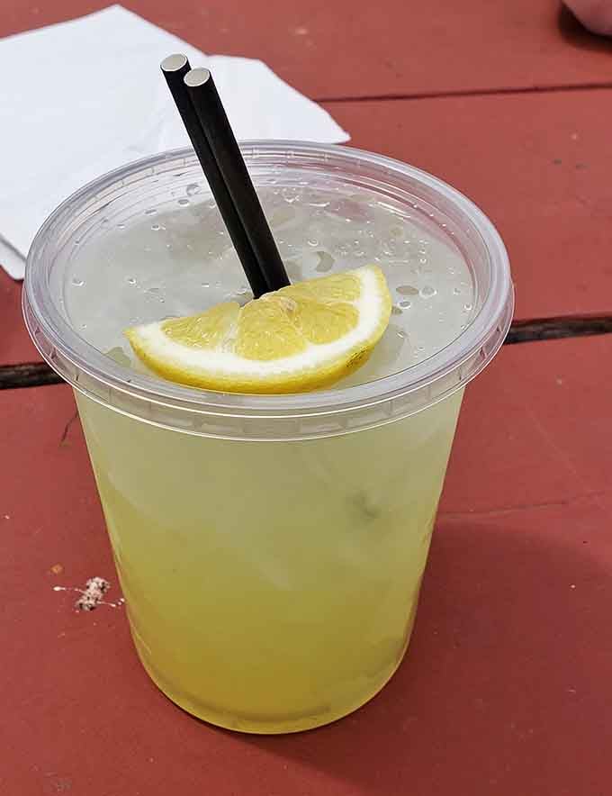 Fresh lemonade with actual lemon, the kind that makes you remember what real refreshment tastes like.
