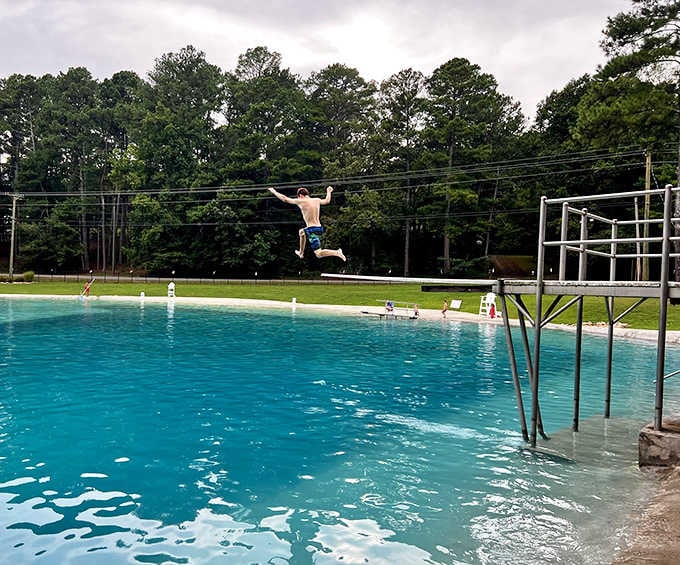 That diving board has launched a thousand belly flops and twice as many childhood memories already.
