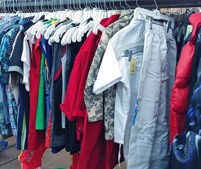 Colorful kids' clothing hangs ready for new adventures, because childhood memories shouldn't require a second mortgage to create.