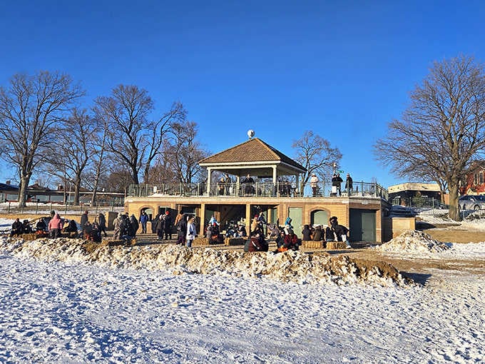 Winter turns the beach into a serene snow globe scene that's almost too pretty to disturb.