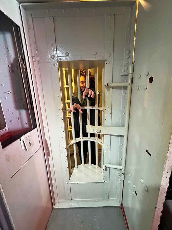 Standing behind bars gives you a taste of what inmates experienced, minus the actual spinning sensation.