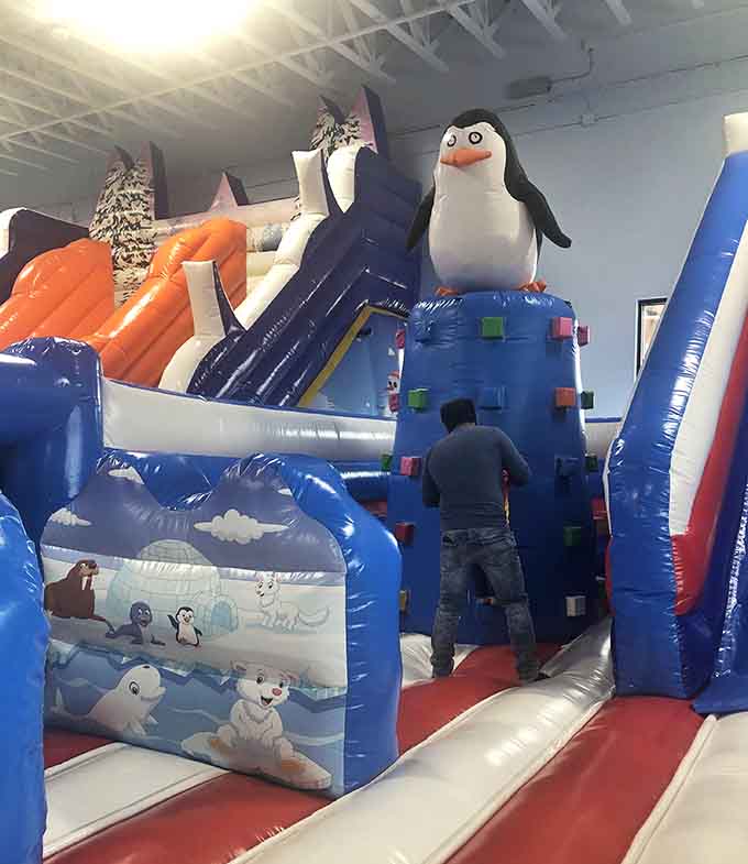 Arctic-themed inflatables featuring penguins who've never experienced Texas heat. Lucky them, honestly.