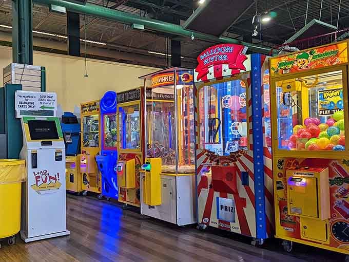 The arcade lineup glows like a Vegas strip designed specifically for the juice box and goldfish cracker crowd.