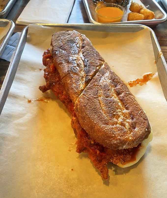 The Red Machine delivers breaded perfection that could make a vegetarian reconsider their life choices, honestly.
