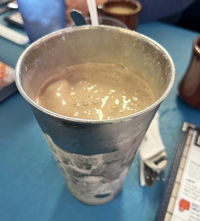 A milkshake in a metal cup means extra servings, which is basically the restaurant saying they like you.