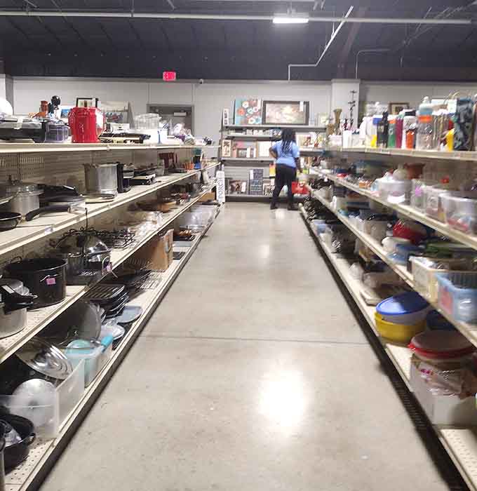 Kitchen essentials line the shelves in colorful abundance, turning cooking dreams into affordable reality one gadget at a time.
