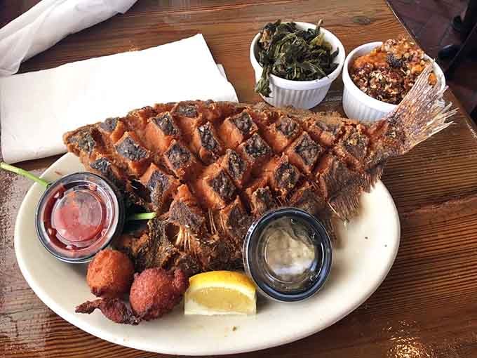 That whole fried flounder is so fresh it probably knew the tide schedule better than you do this morning.