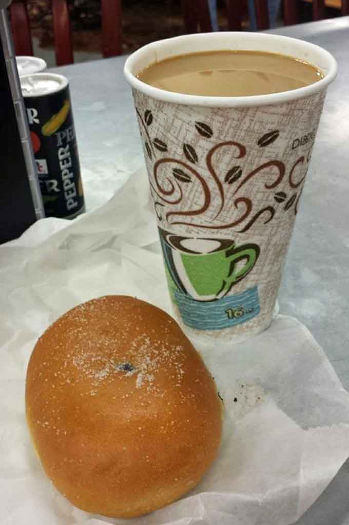 Coffee and a poppy seed kolache create the perfect road trip breakfast, fueling adventures one delicious bite at a time.