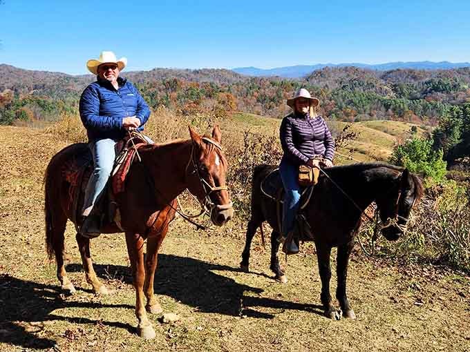 Those cowboy hats aren't just for show when you're surveying autumn's tapestry from horseback up here.