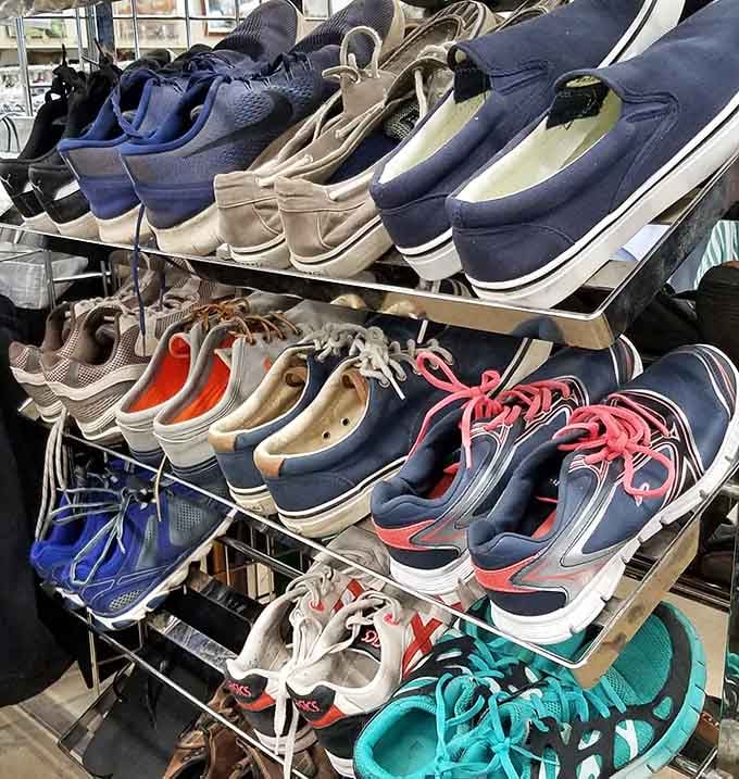 Shoes of every style and color march across the racks, from sneakers to dress shoes, all seeking their sole mates.