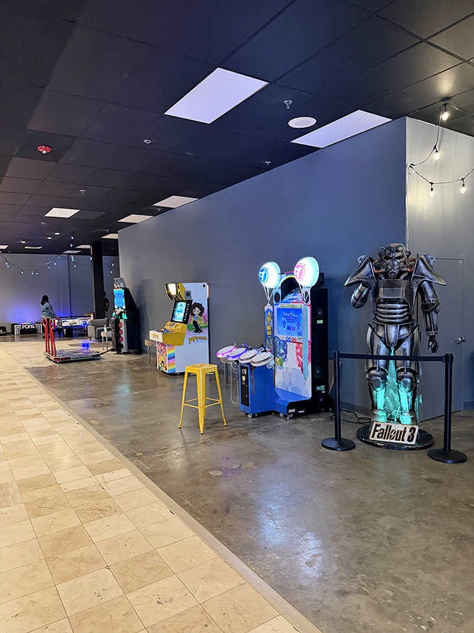 A Fallout statue guards the entrance like the world's coolest bouncer at gaming's most welcoming club.