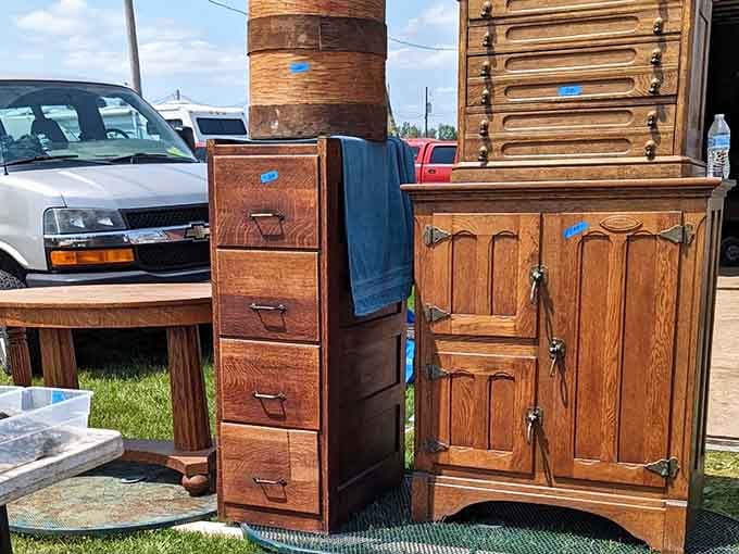 Solid wood furniture with blue price tags stands ready to anchor your home with character no big box can match.