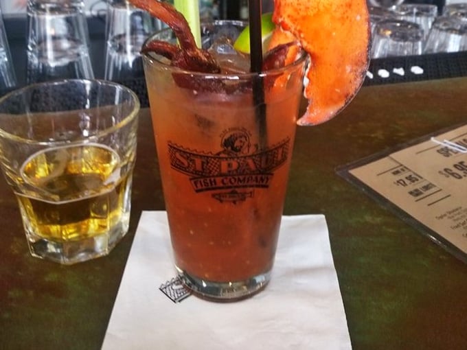Colorful cocktails garnished with lobster claws bring beachside vacation vibes to your Wisconsin dining experience right here.