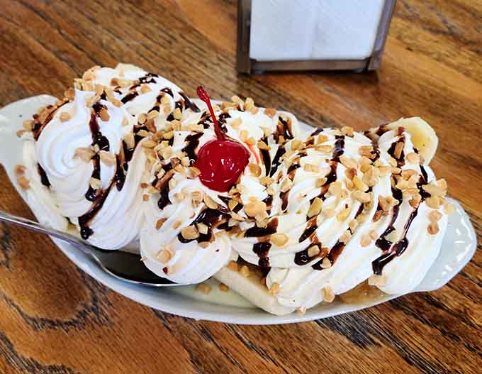 The banana split: three scoops of happiness drowning in toppings, chocolate sauce, and pure joy.