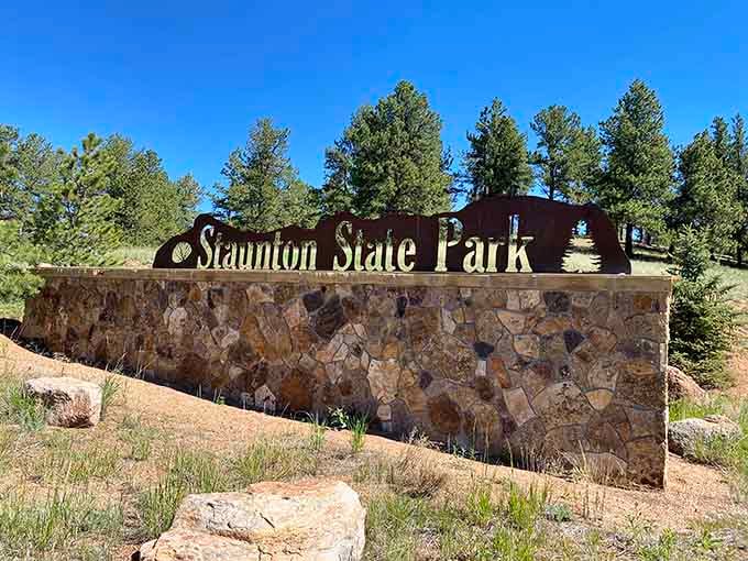 The park entrance welcomes you with rustic stonework that says "adventure ahead" without being too dramatic about it.